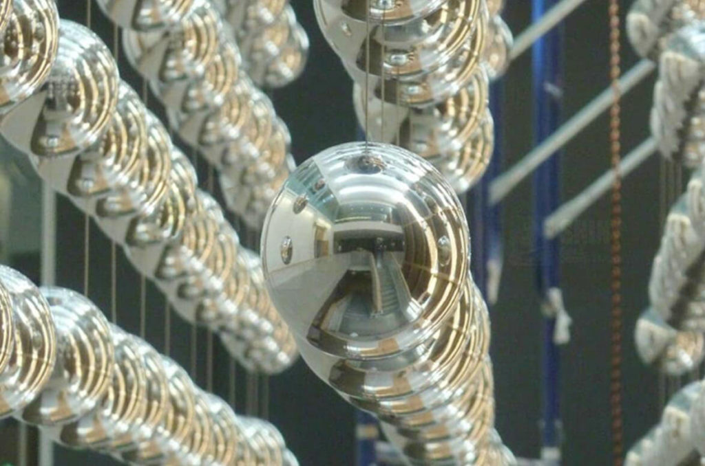 Floating Steel Ball Sculpture - metal sphere world